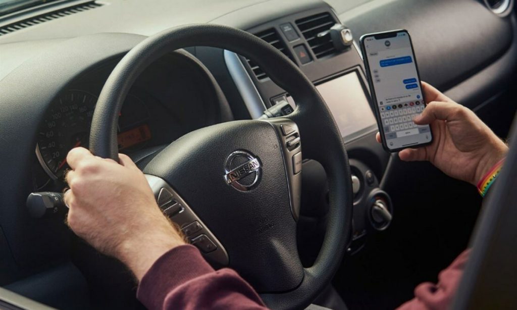Distracted driving is up in Ontario; holding a mobile device a key ...